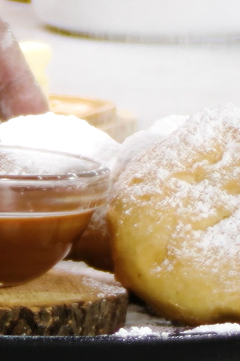 Sweet plantain beignets with powdered sugar