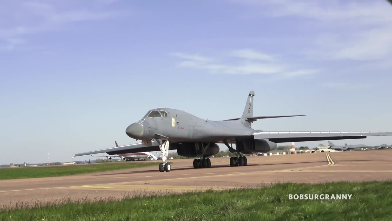 Watch the B-1 Lancer drop low - then 4 engines tear the sky open