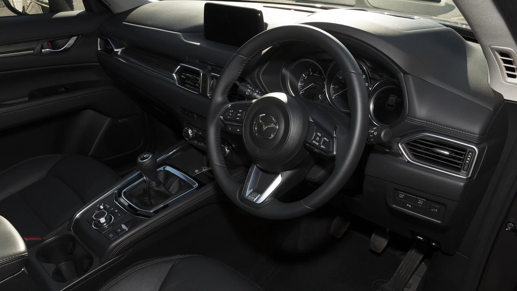 Mazda’s shift from knobs to touchscreens