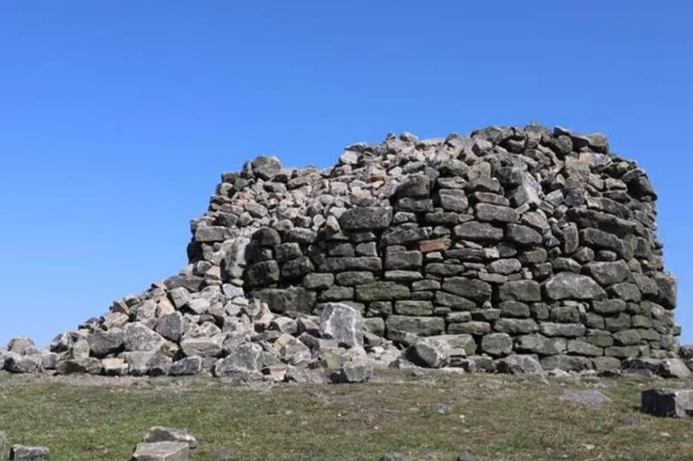 Why Winter Hill's iconic 'Two Lads' stone cairns are being pulled down