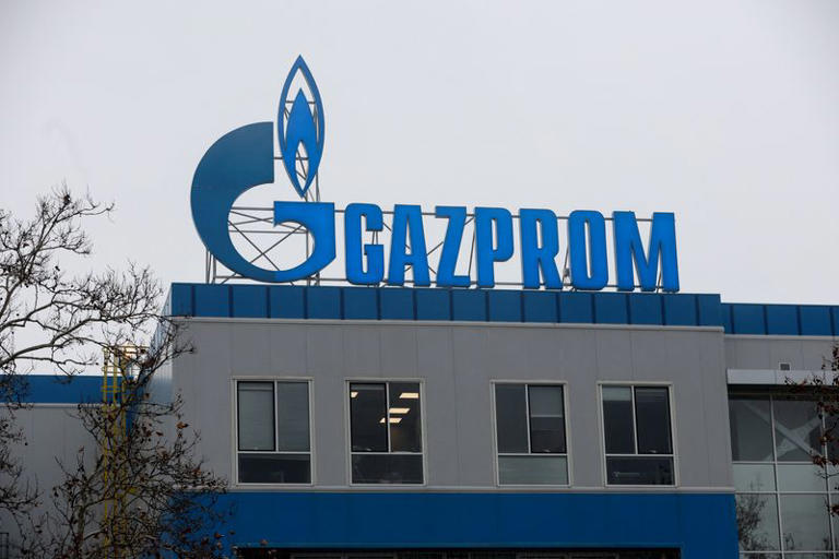 Shares of Russia's Gazprom fall below 100 roubles, lowest since 2009