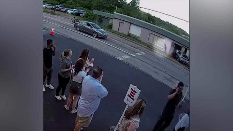 Suspect runs from police after crashing car into building across from ...