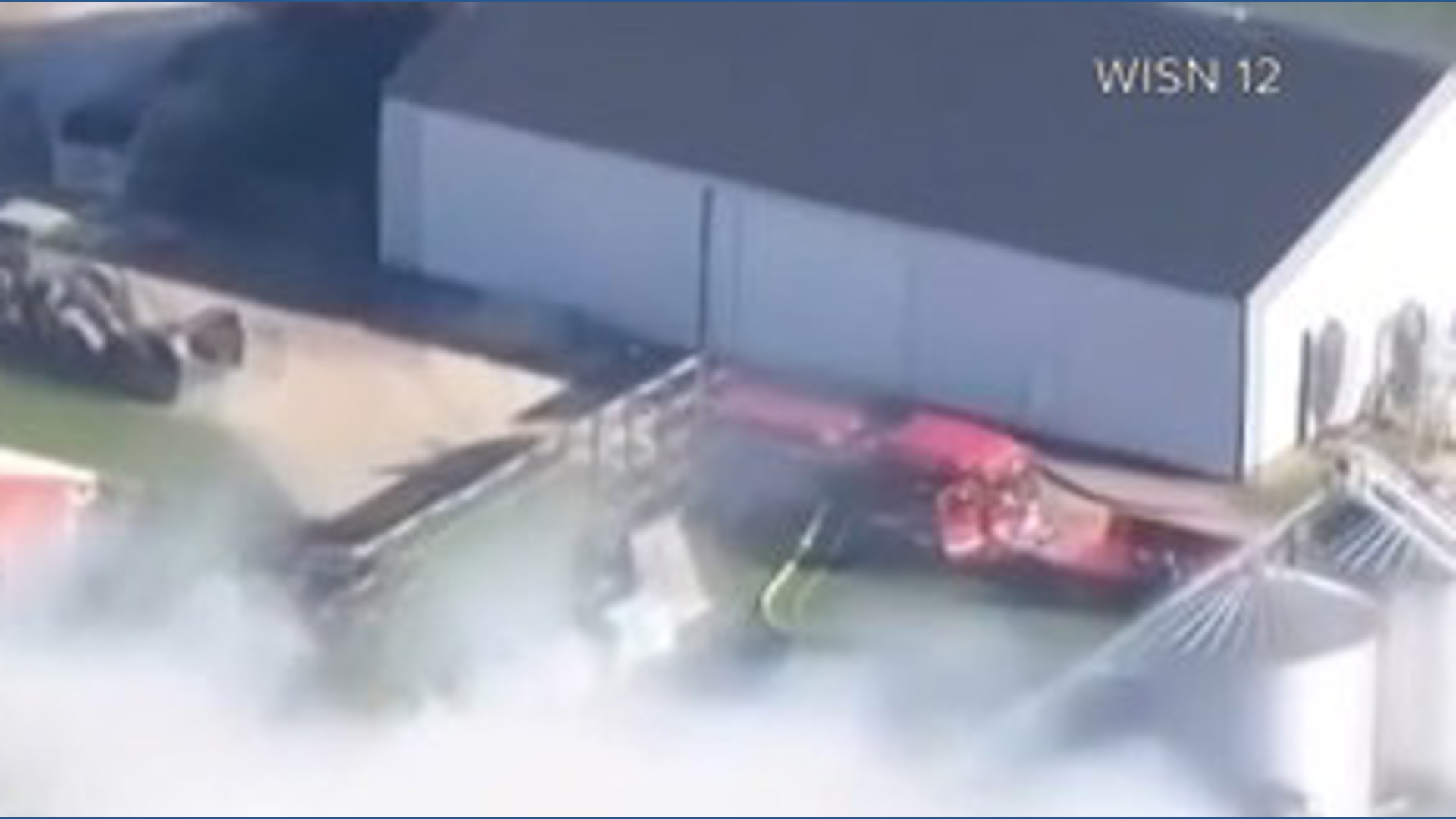 Wisconsin officials work to tame dairy barn fire