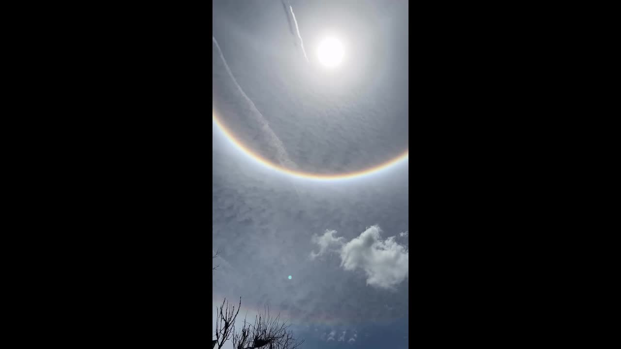 Rare sun halo seen over homes in Malaysia