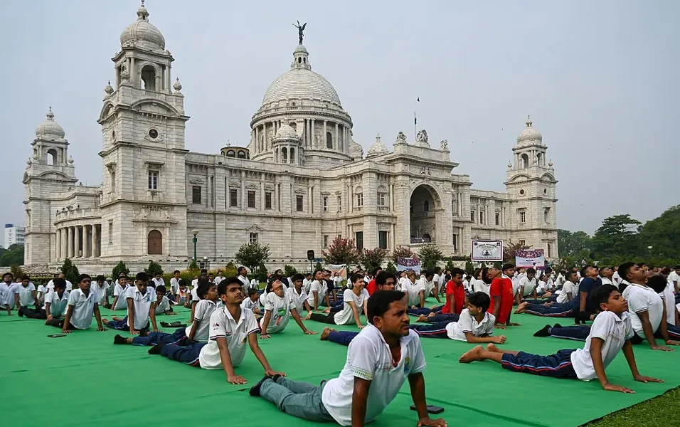 PM Modi’s saffron-white angavastram draws global Yoga Day buzz
