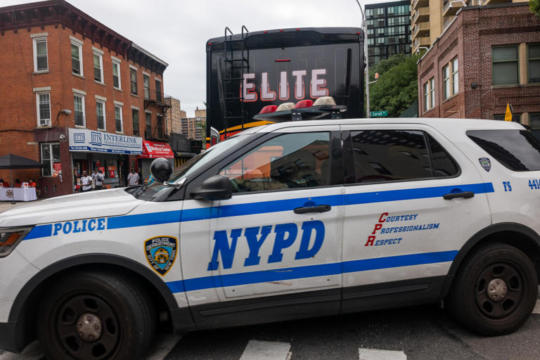 Suspect drives into cops in stolen car, cop on hood of car shoots suspect