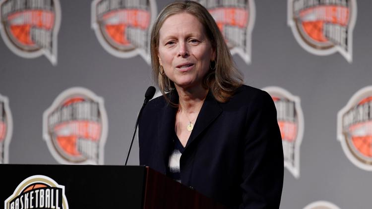 Founding WNBA president Val Ackerman receiving Indiana Fever's Lin Dunn ...