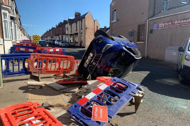 Police issue updated statement after car flipped in crash near ...