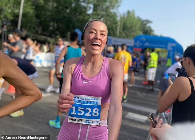 Amber Heard shares rare glimpse of daughter after finishing Spain 10k