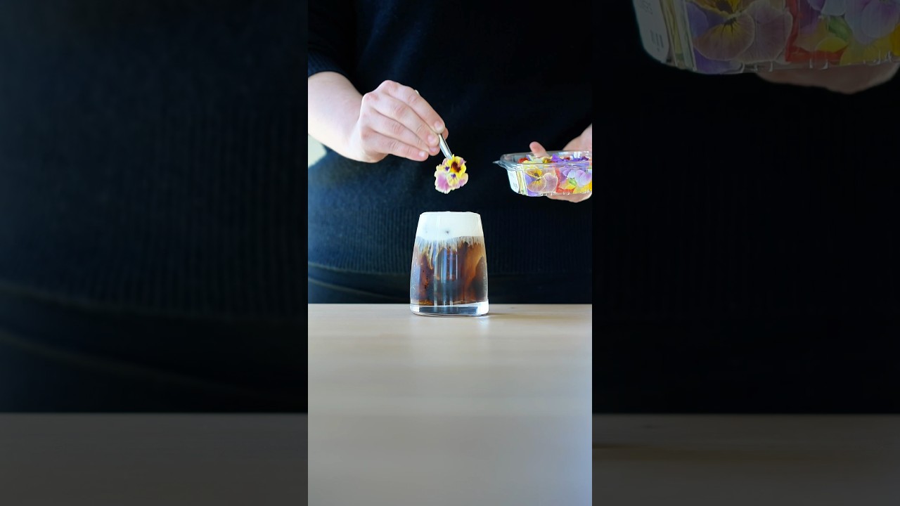 Vanilla rose cold brew with edible flowers