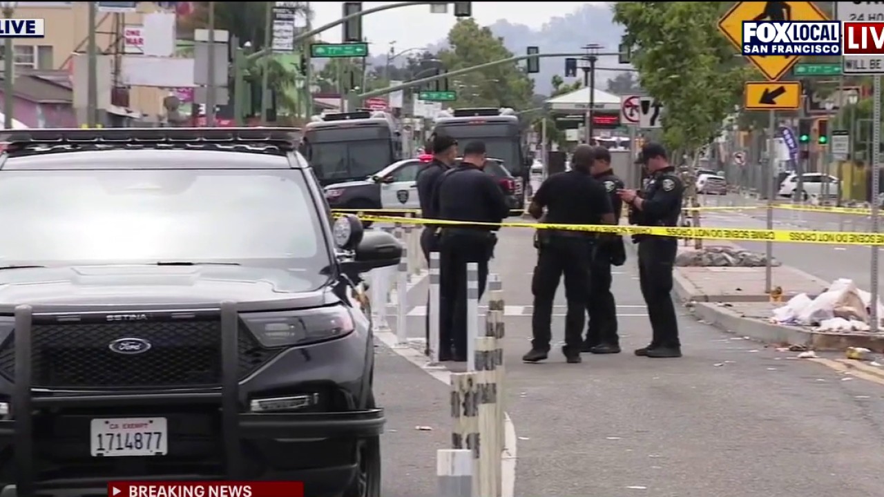 Oakland police congregate on International Boulevard
