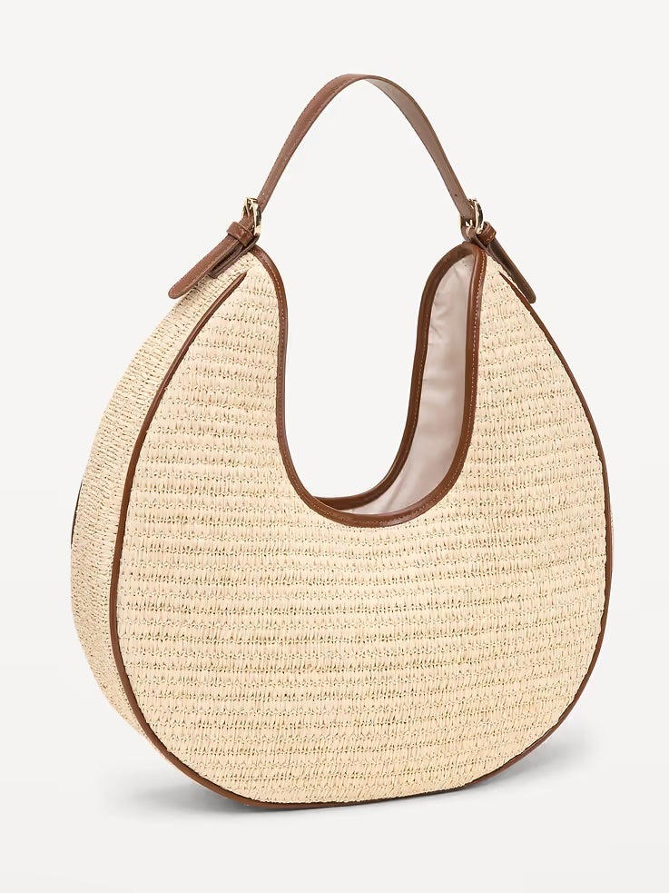 Fashion people keep carrying this bag with everything right now