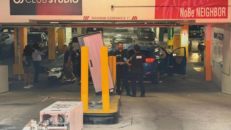 Driver killed after single-vehicle collision inside parking garage ...