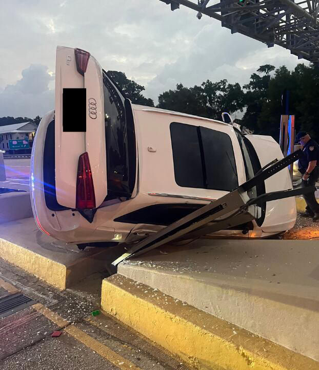 Driver accused of DWI after car flips at Causeway toll plaza
