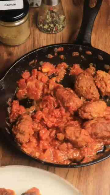 Authentic Greek soutzoukakia meatballs in rich tomato sauce