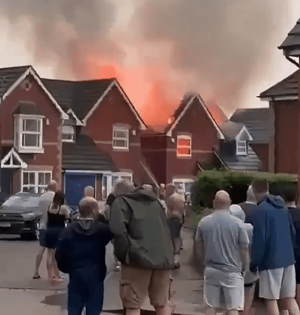 Neighbours watch on in horror as lightning strike destroys family home ...