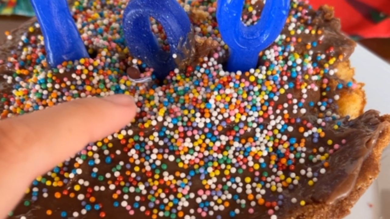 Girl hands clueless dad a birthday cake with a firecracker hidden as a ...