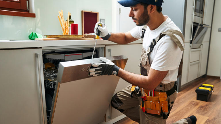 How to troubleshoot the clean light flashing on a KitchenAid dishwasher