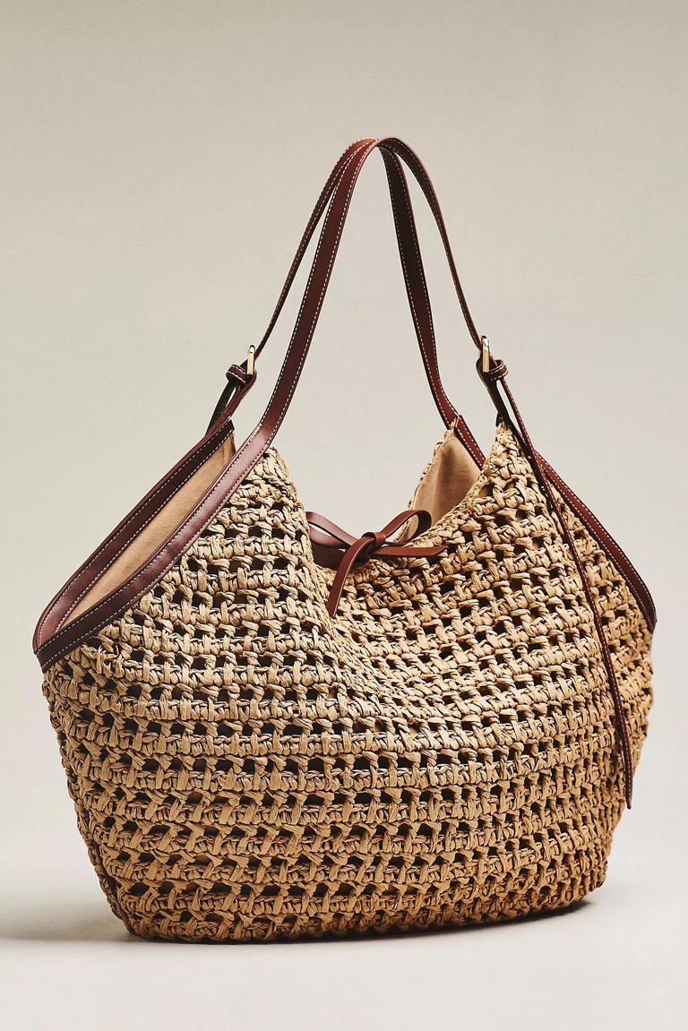 Fashion people keep carrying this bag with everything right now