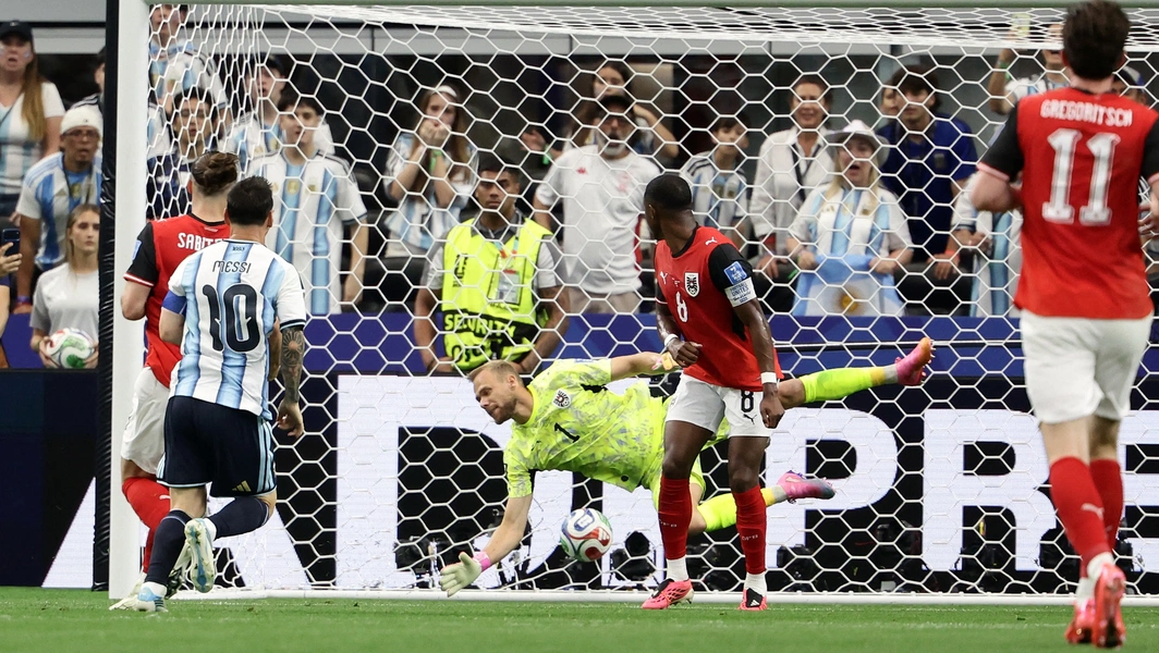 Messi breaks World Cup scoring record as Argentina advance