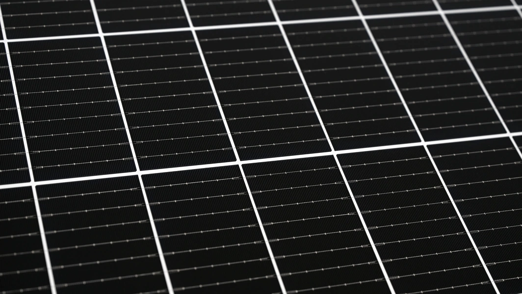 Transparent and black solar panels compared