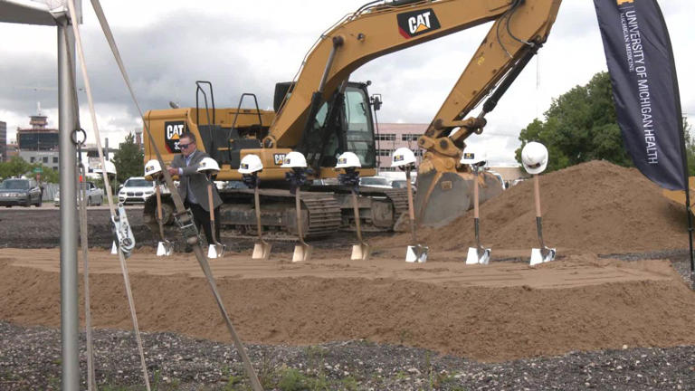 Crews break ground on $60M U-M Sparrow surgery center in downtown Lansing