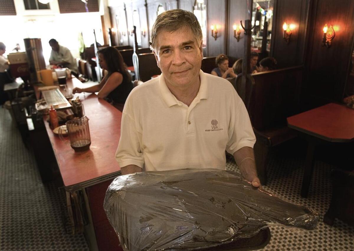 Longtime leader of Raleigh's oldest restaurant dies at age 68