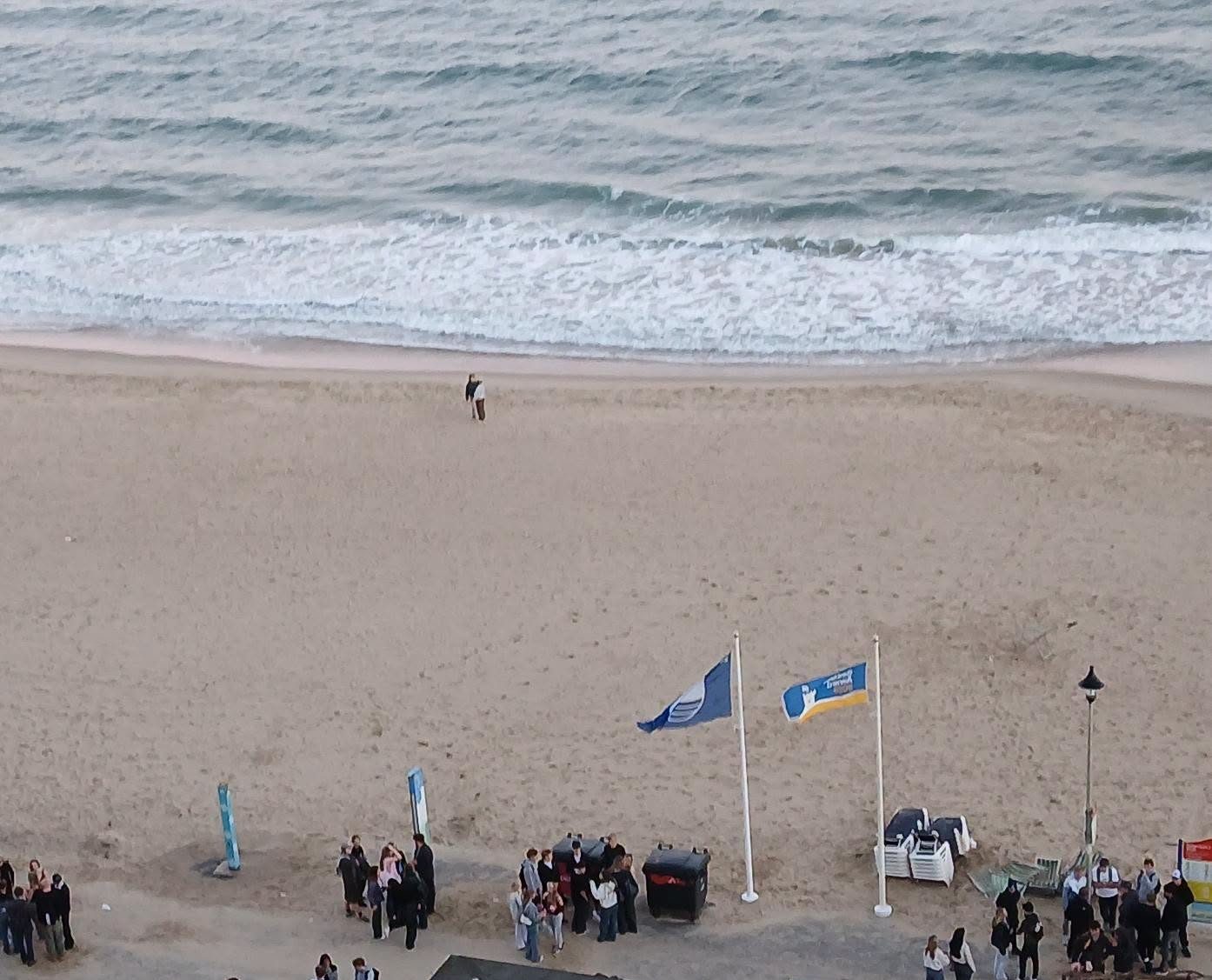 Mother 'swimming with her son' dies after being pulled from sea