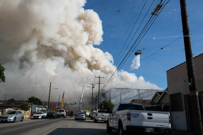 Fire chiefs make progress on warehouse inferno that smothered LA under ...