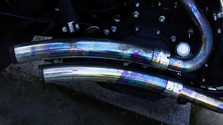 Why do some motorcycle exhaust pipes turn blue?