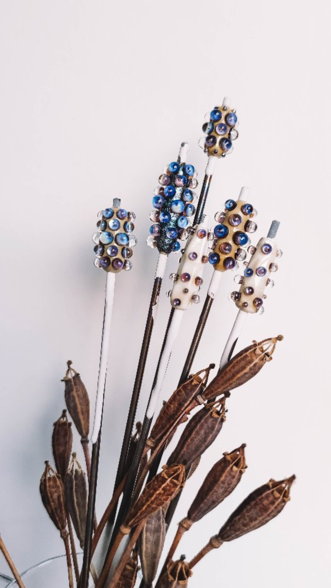Delicate glass craftsmanship creating captivating artistic pieces