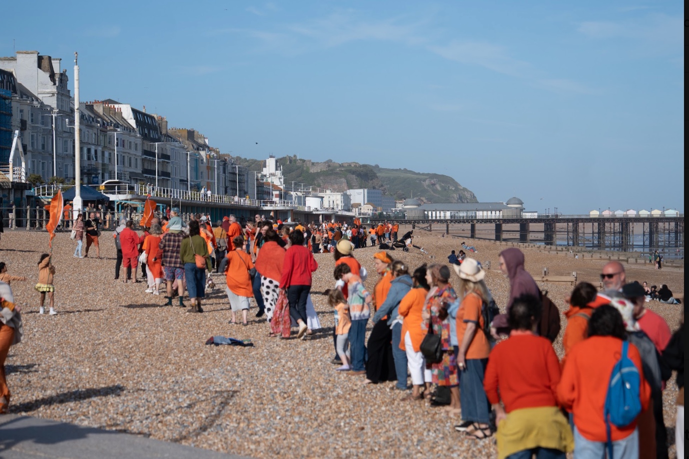 Hope was created when over 600 people made Hastings beach orange as a ...