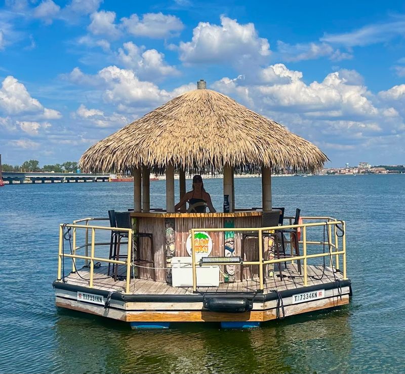 A floating tiki boat with panoramic lake views makes this one of the ...