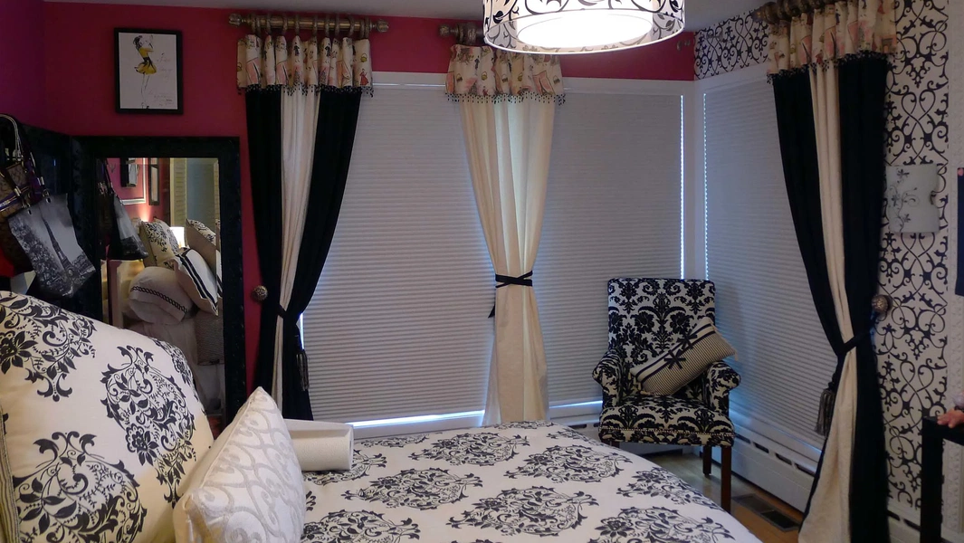 Designers shift from minimalism to bold, floral curtains