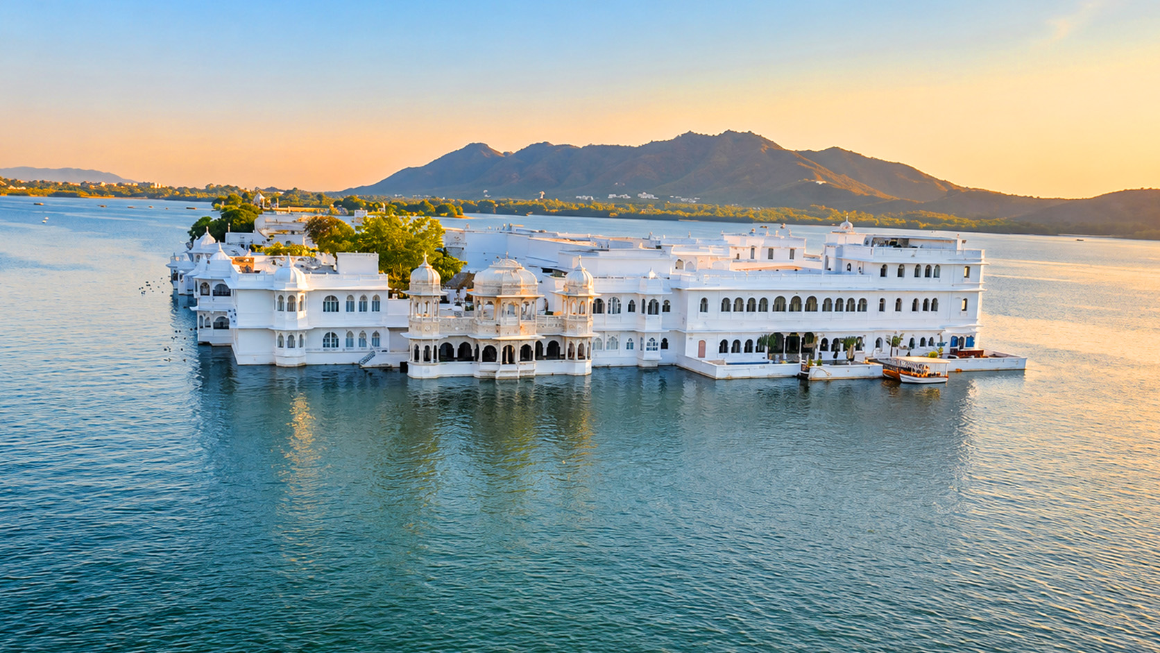 Why does this palace appear to float on Udaipur’s lake?