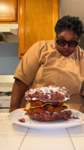 An apple fritter and pork chop together