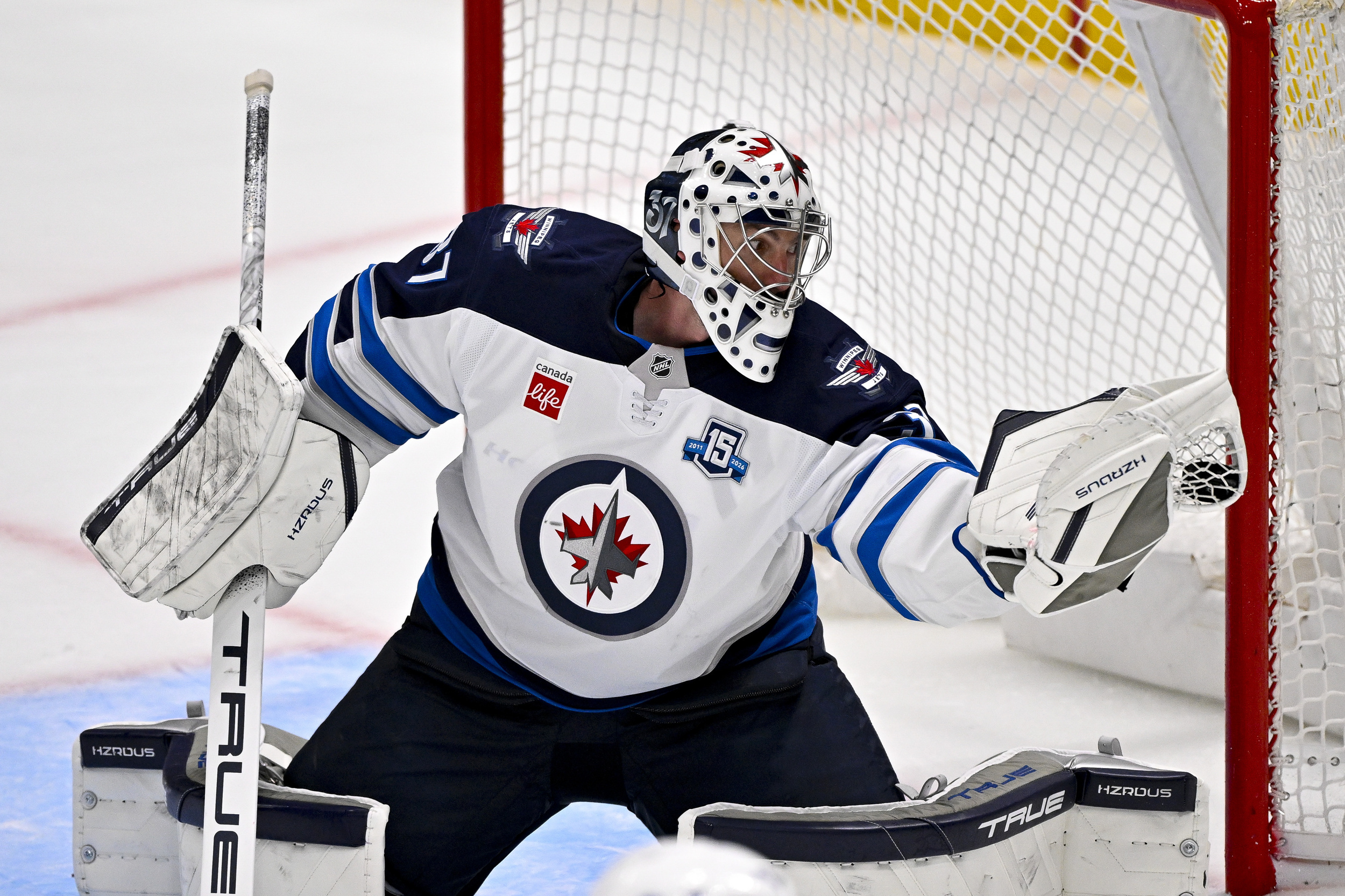 How would a Connor Hellebuyck trade compare to other historic NHL ...