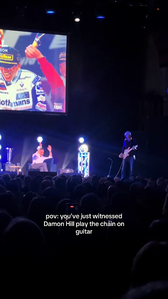 Former F1 champion Damon Hill performs The Chain on guitar
