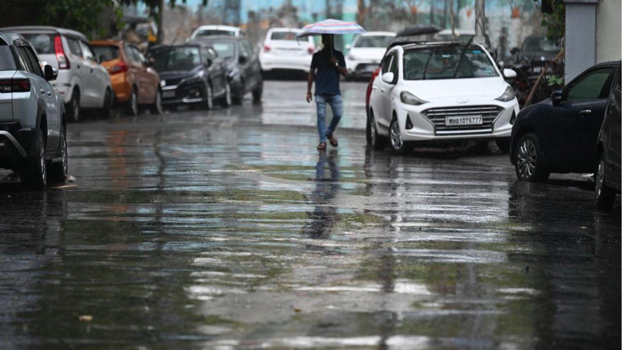 In photos rain lashes parts of Mumbai and suburbs on Tuesday IMD issues ...