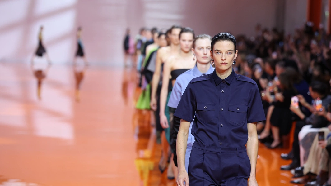 Prada spotlights minimalist denim in Milan menswear show