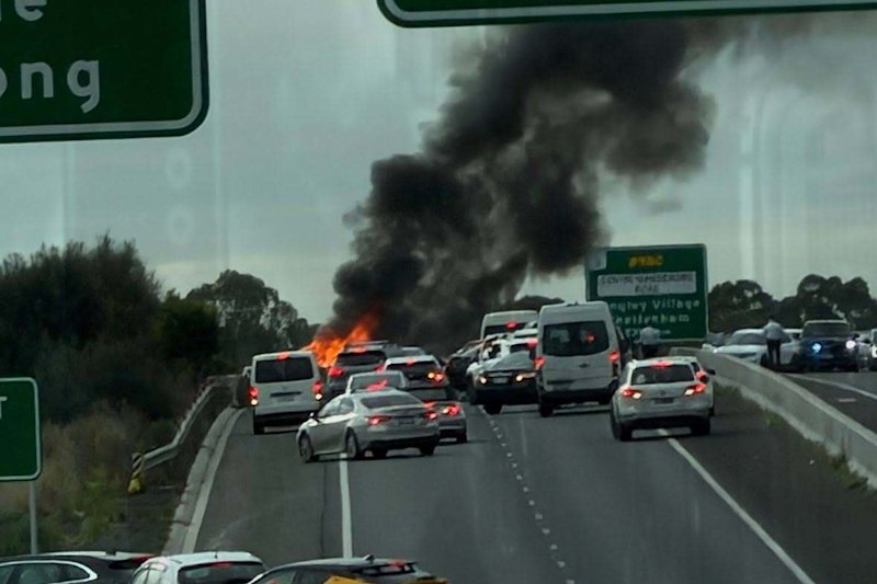 Teens jump freeway barriers as stolen car bursts into flames