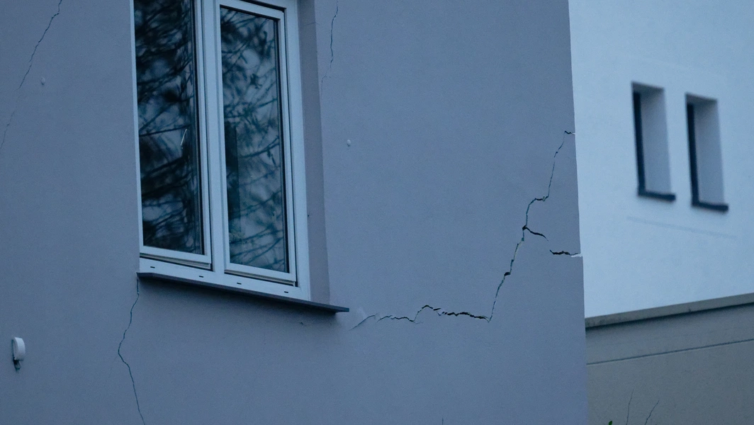 Identifying and addressing wall crack issues