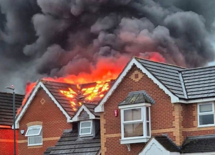 House bursts into flames after being struck by lightning in thunderstorm