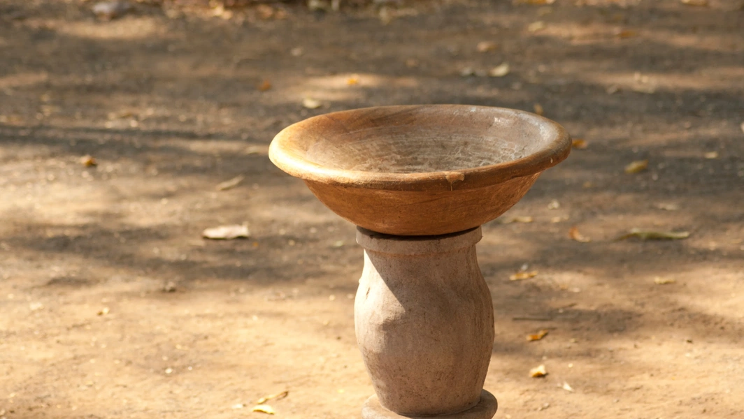 DIY birdbaths from repurposed stools and bowls