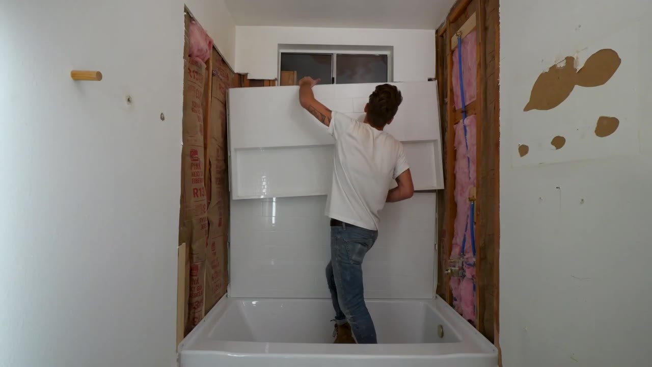 I tore out the old tub - and found what was hiding behind it