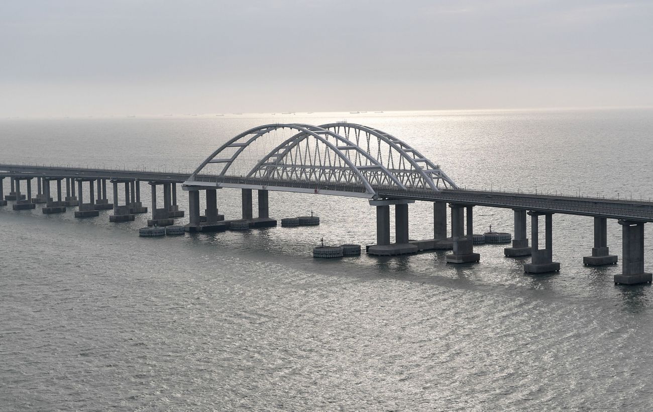 Crimea hit by massive drone attack as fires break out and key bridge closed