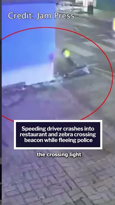 Speeding driver crashes into restaurant and zebra crossing beacon while ...