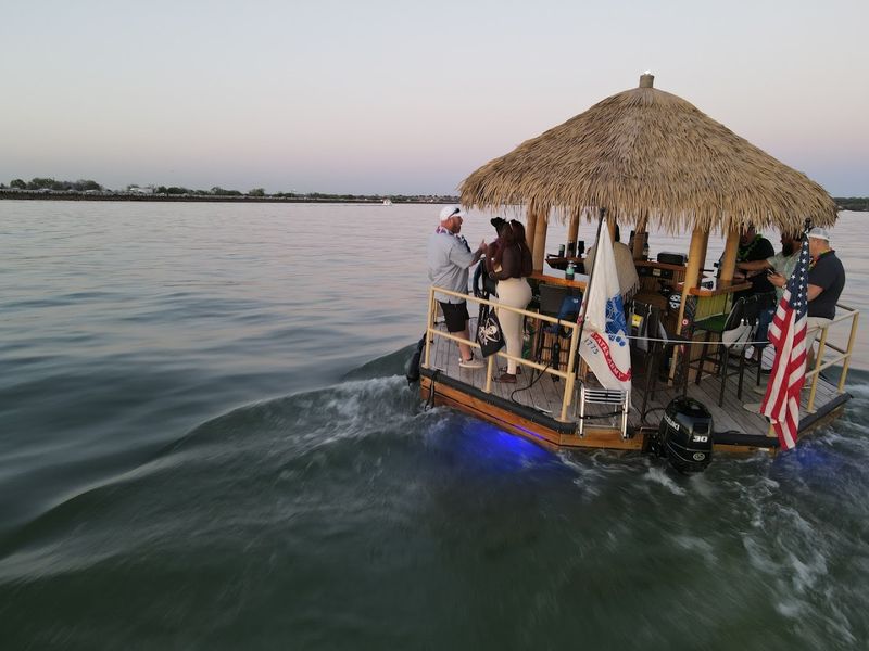 A floating tiki boat with panoramic lake views makes this one of the ...