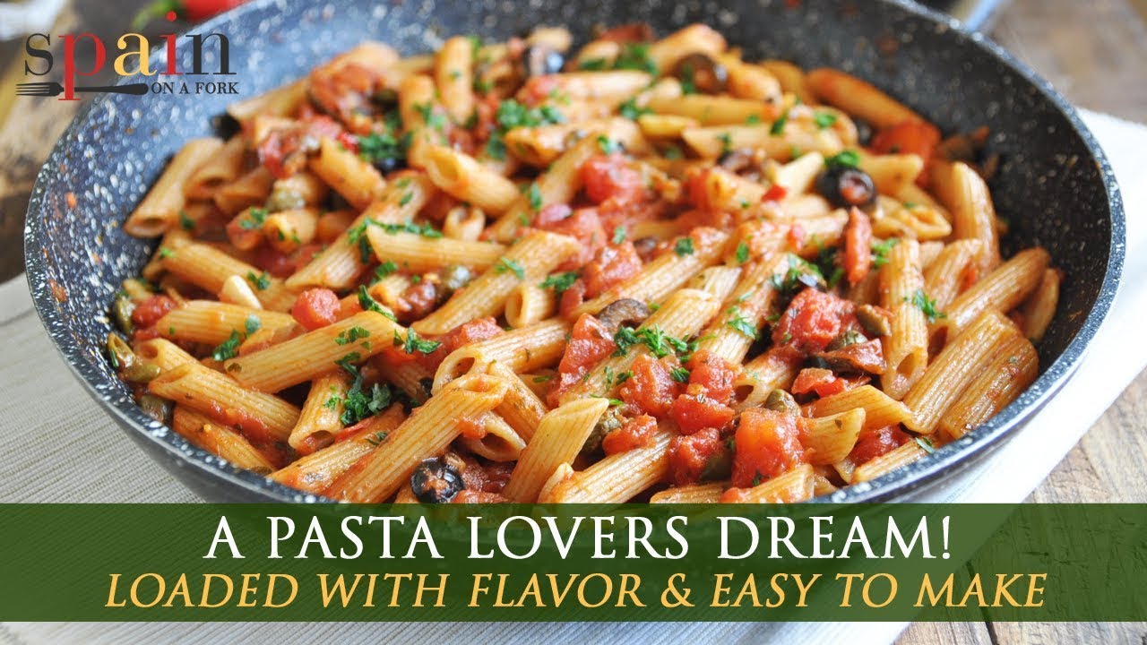 Spicy penne pasta with anchovies, capers and black olives