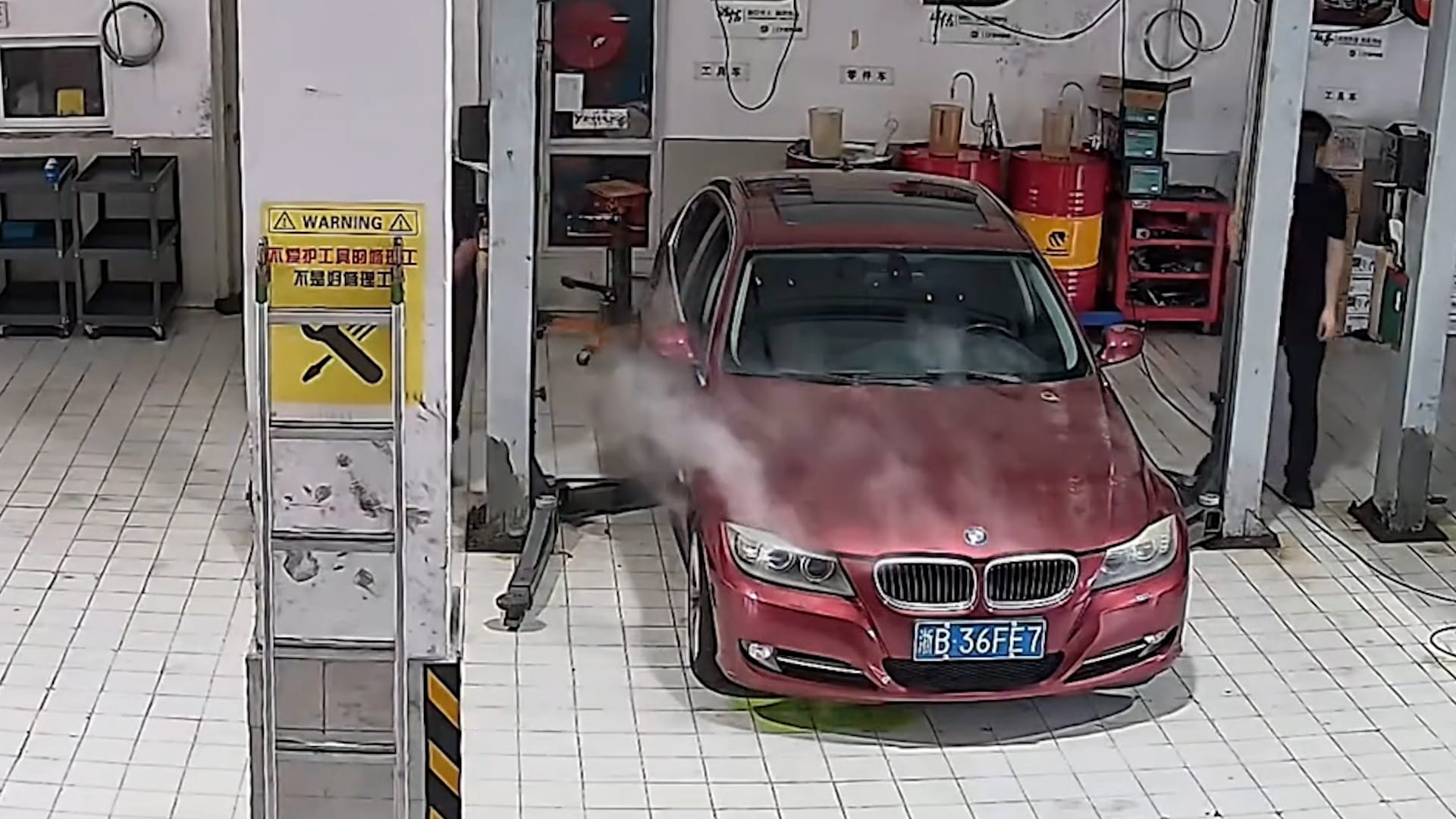 Coolant tank bursts during engine cleaning at repair shop